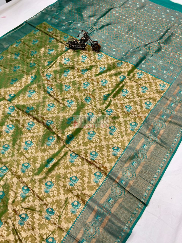 Mahendi green color banarasi silk saree with zari weaving work