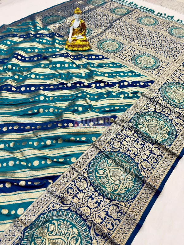 Firoji and navy blue color kanchipuram silk saree with zari weaving work