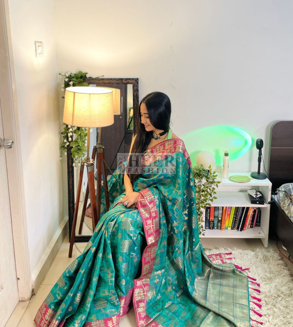 Rama green color katan silk saree with zari weaving work