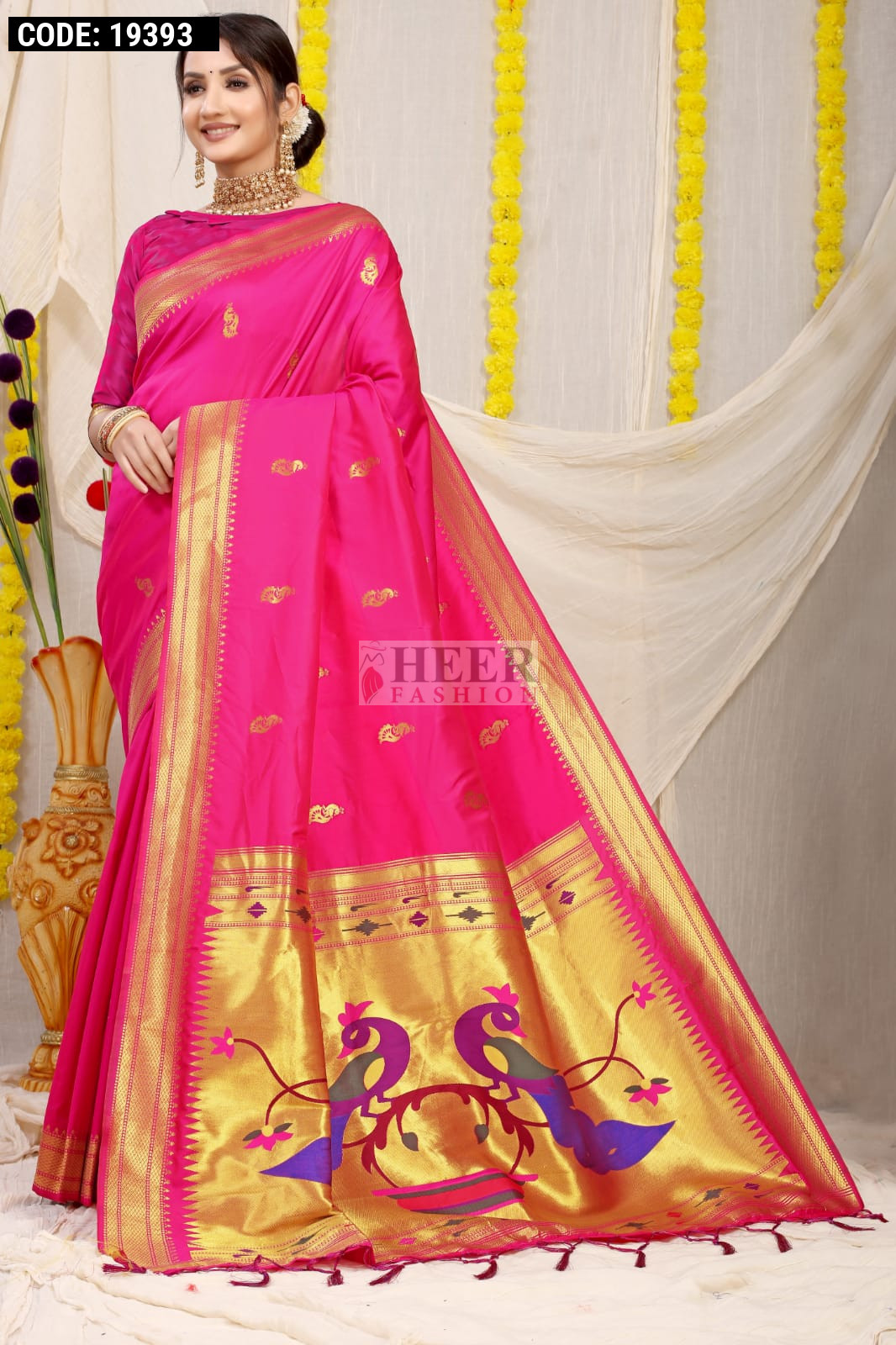 Rani pink color paithani silk saree with golden zari weaving work