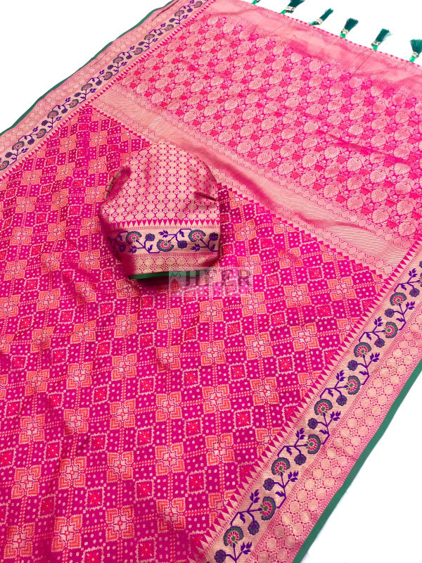 Pink color patola silk saree with woven design