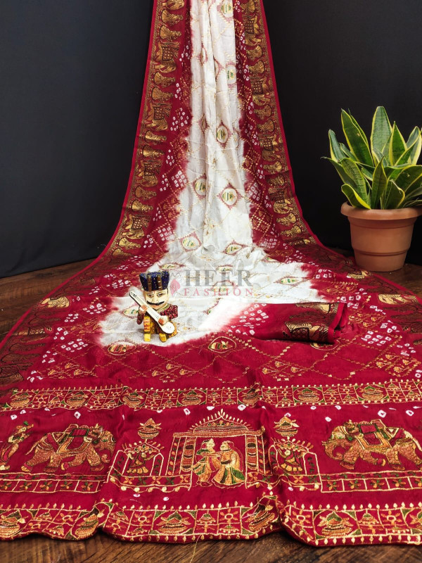White and red color pure hand bandhej bandhani saree with zari weaving work