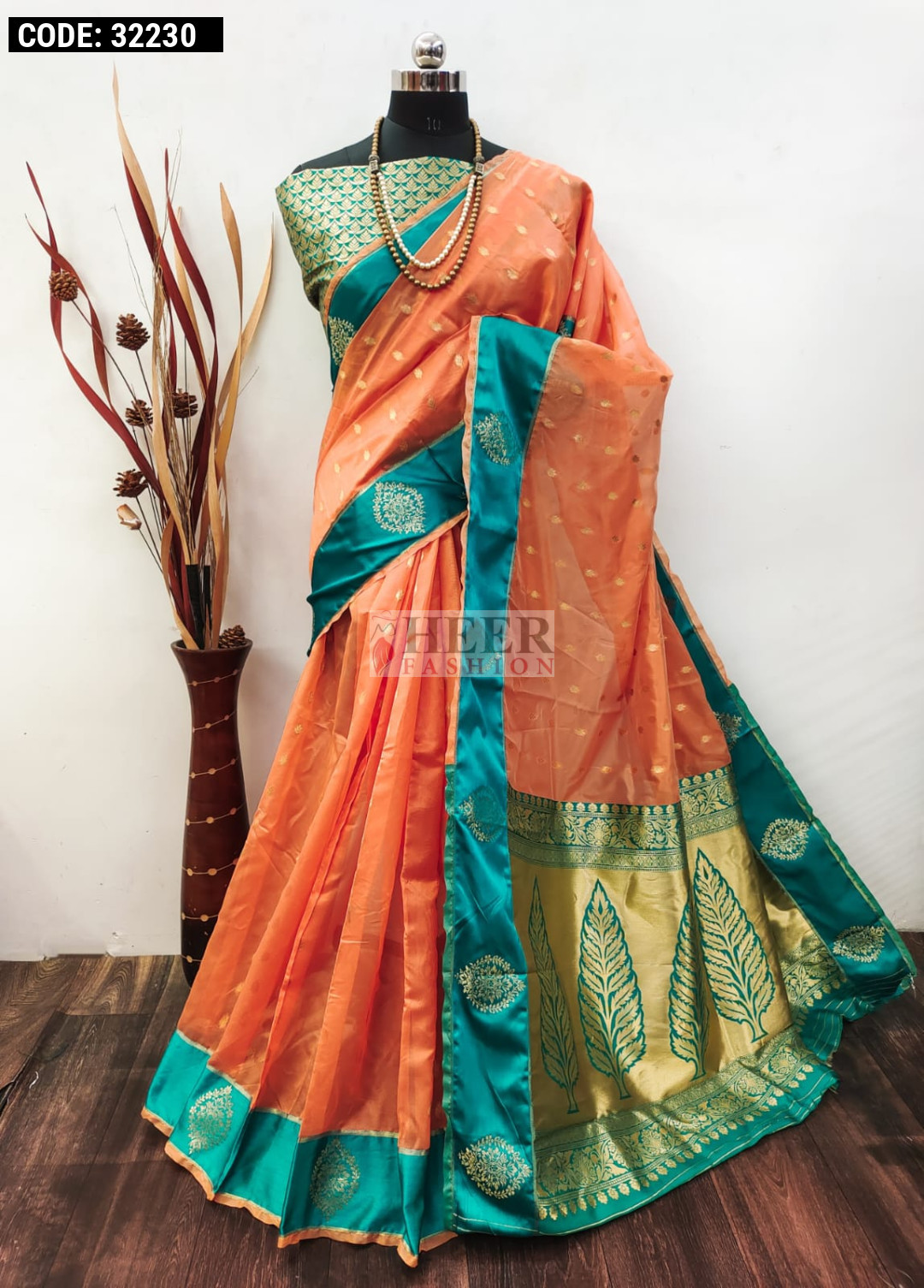 Peach color soft organza silk saree with zari weaving work