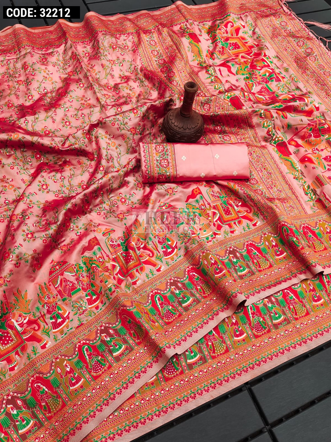 Peach color soft pashmina silk saree with woven design