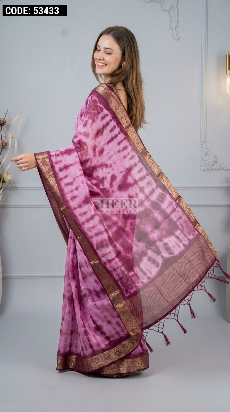 Magenta color soft chiffon saree with zari weaving work